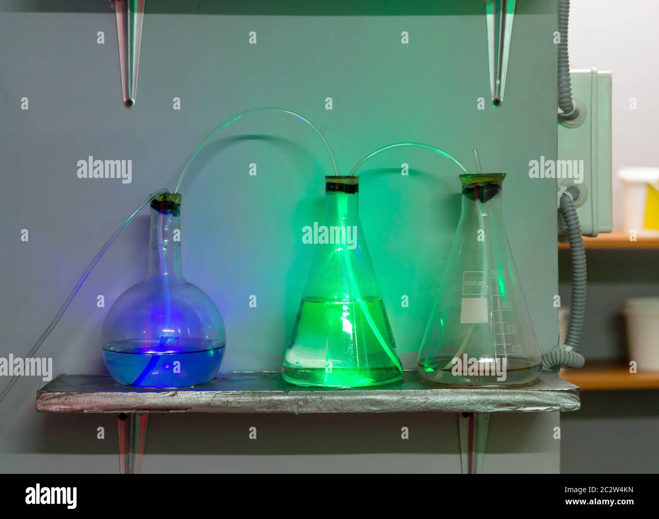 Three flasks with chemical reagents Stock Photo - Alamy