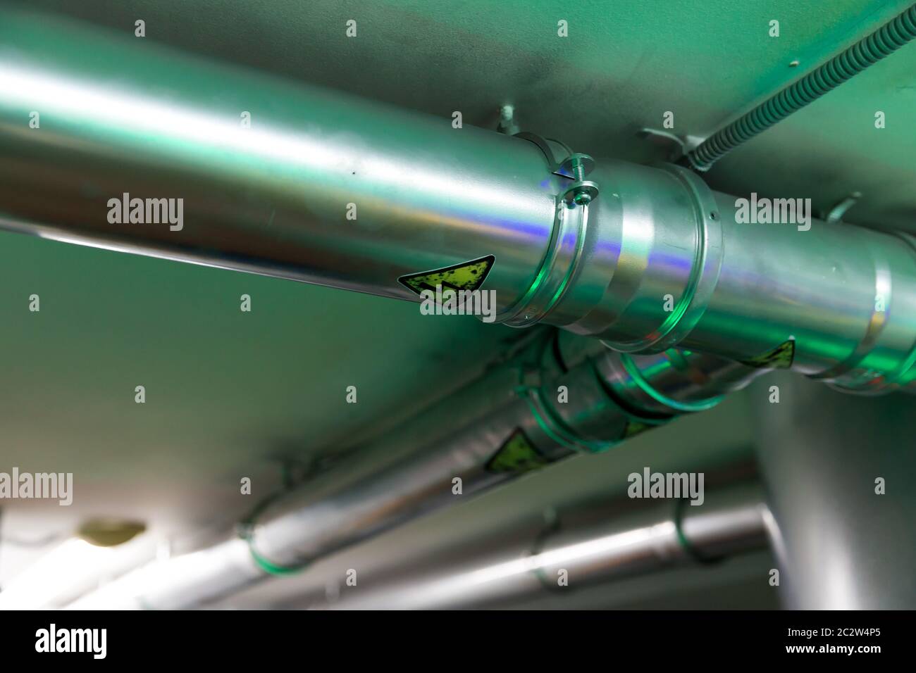 Metal pipe on the ceiling close up Stock Photo - Alamy