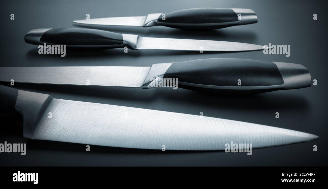 Set of professional kitchen knives Stock Photo - Alamy