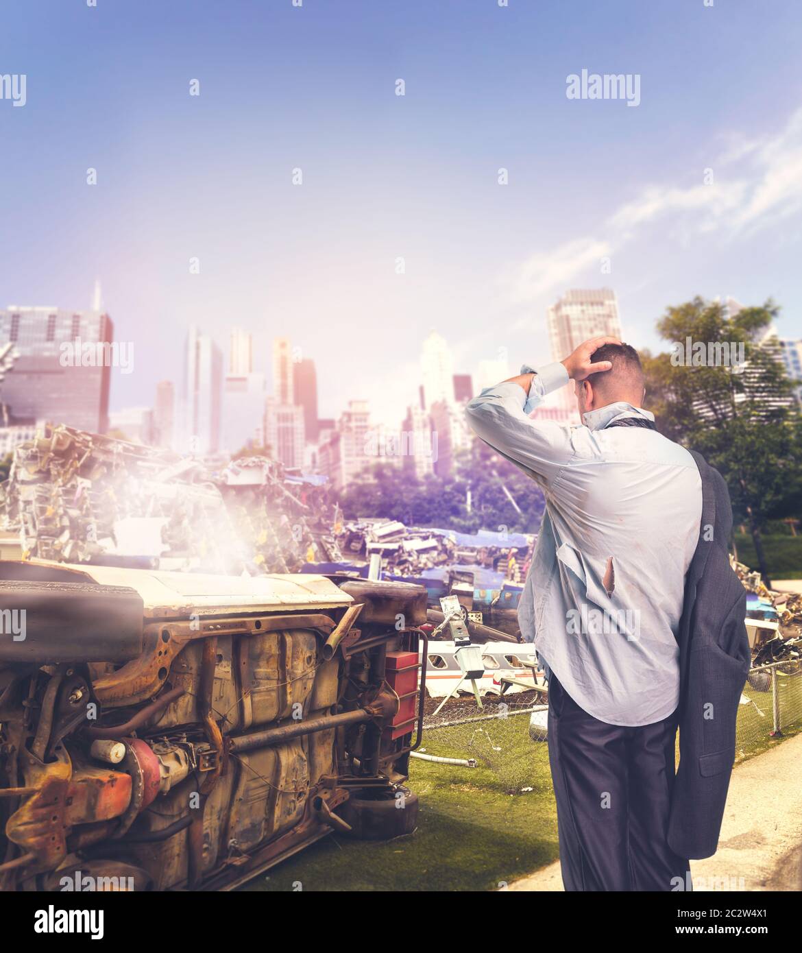 Sad man after crash standing over plane ruins Stock Photo - Alamy