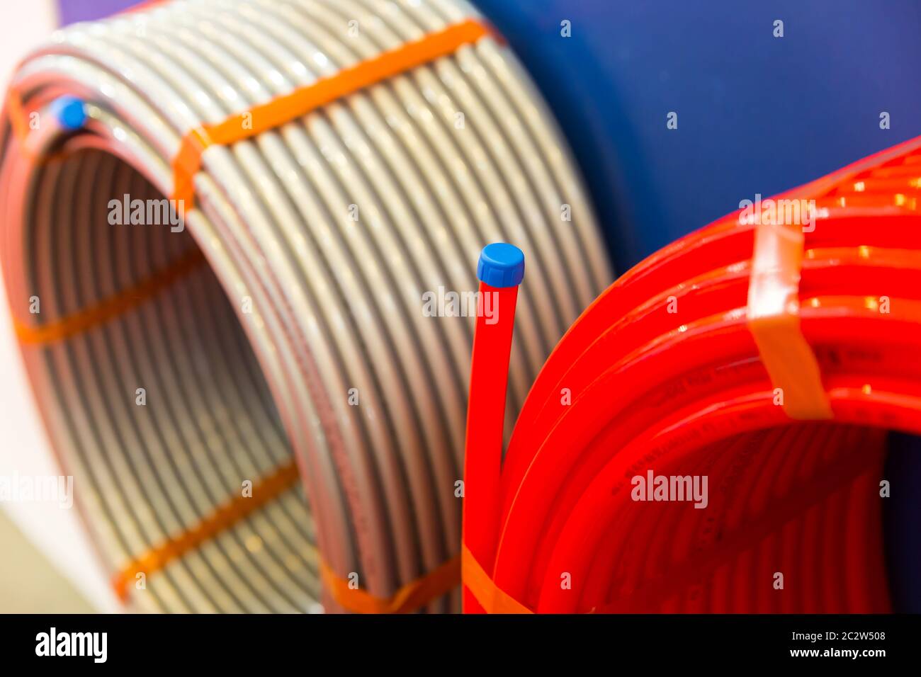 Roll of of plastic pipe in plumbing shop, pvc. Coil of new water ...