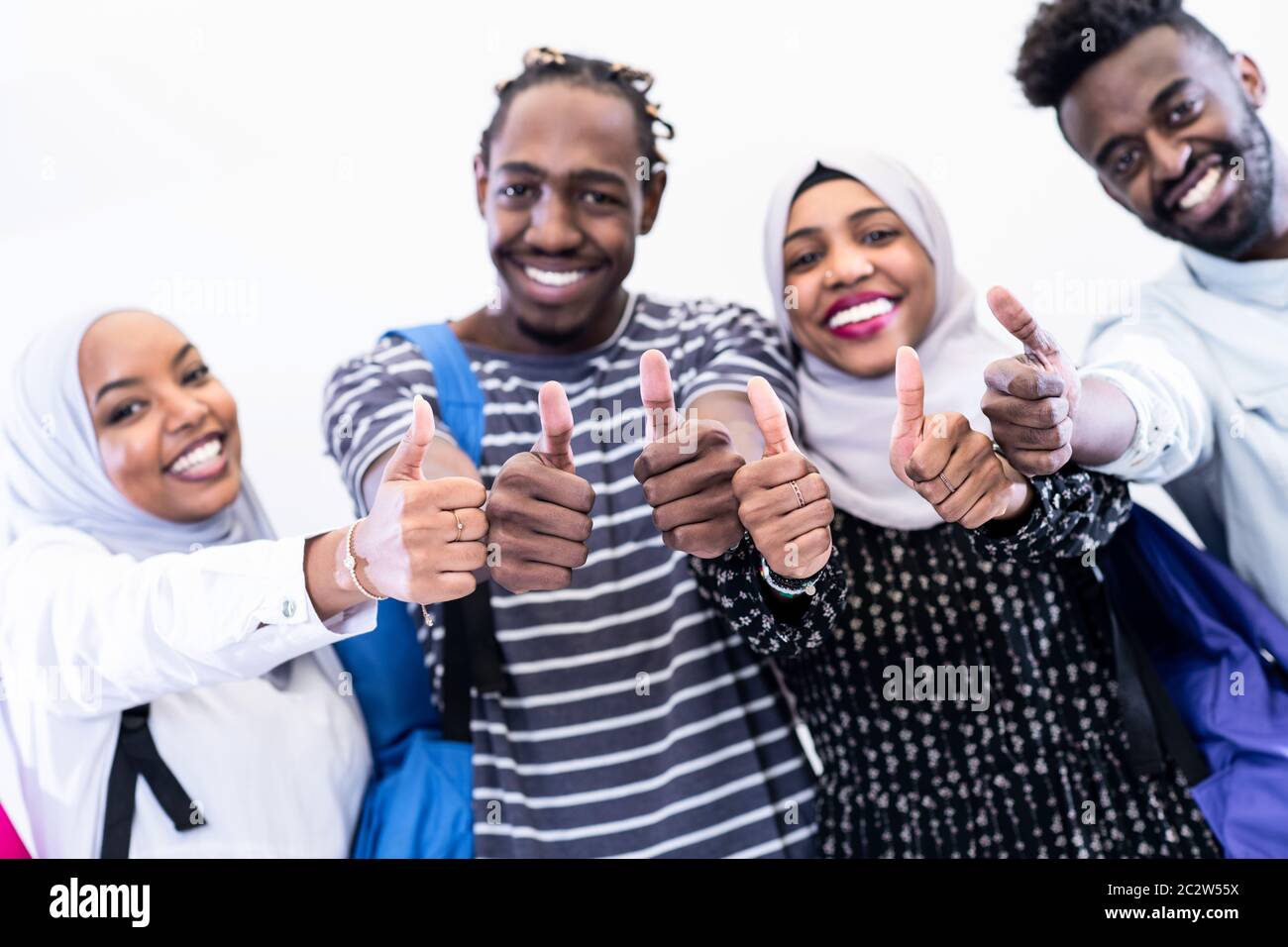 Students showing thumbs up school hi-res stock photography and images ...