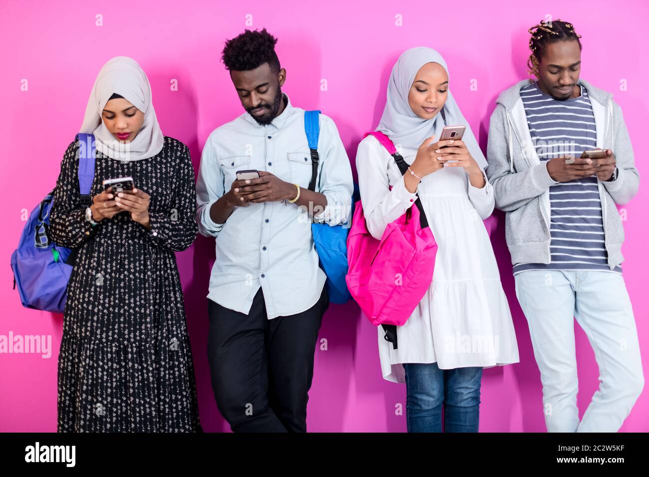african students group using smart phones Stock Photo - Alamy