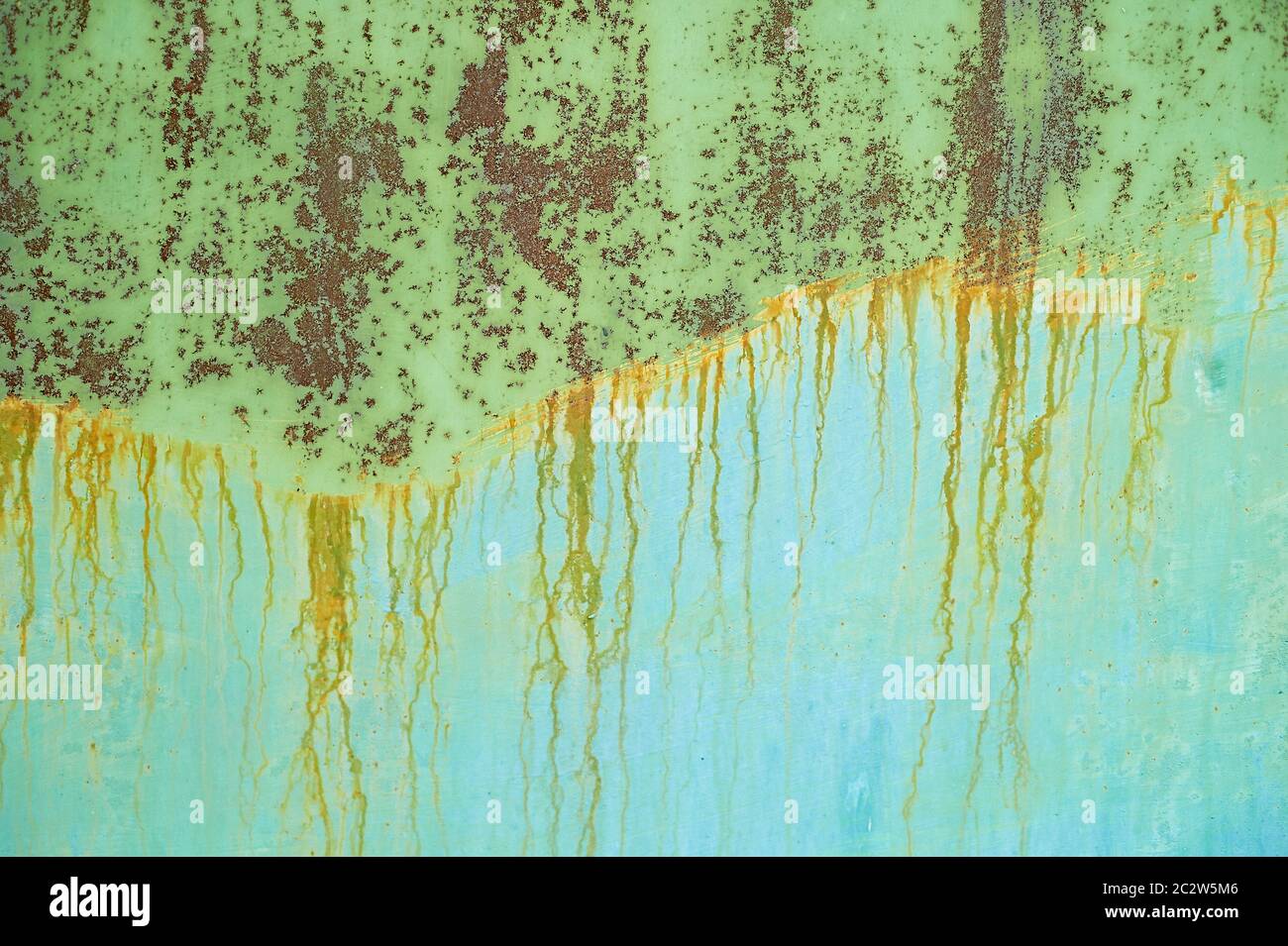 Texture, rust leaks on top of the paint. Metal surface, abstraction ...