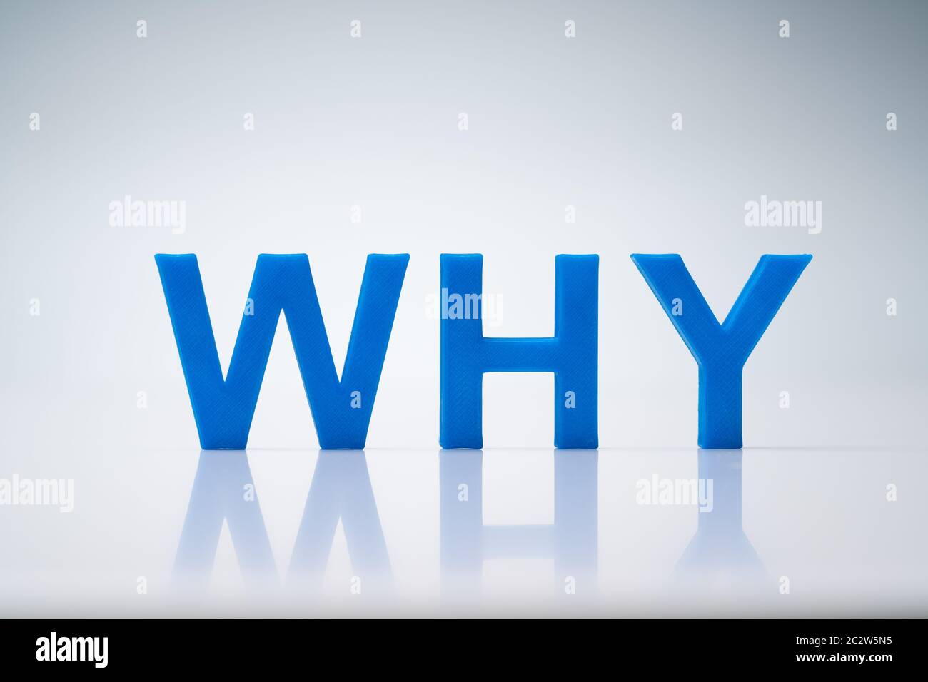 Blue Why Word With Shadow Over White Surface Stock Photo - Alamy
