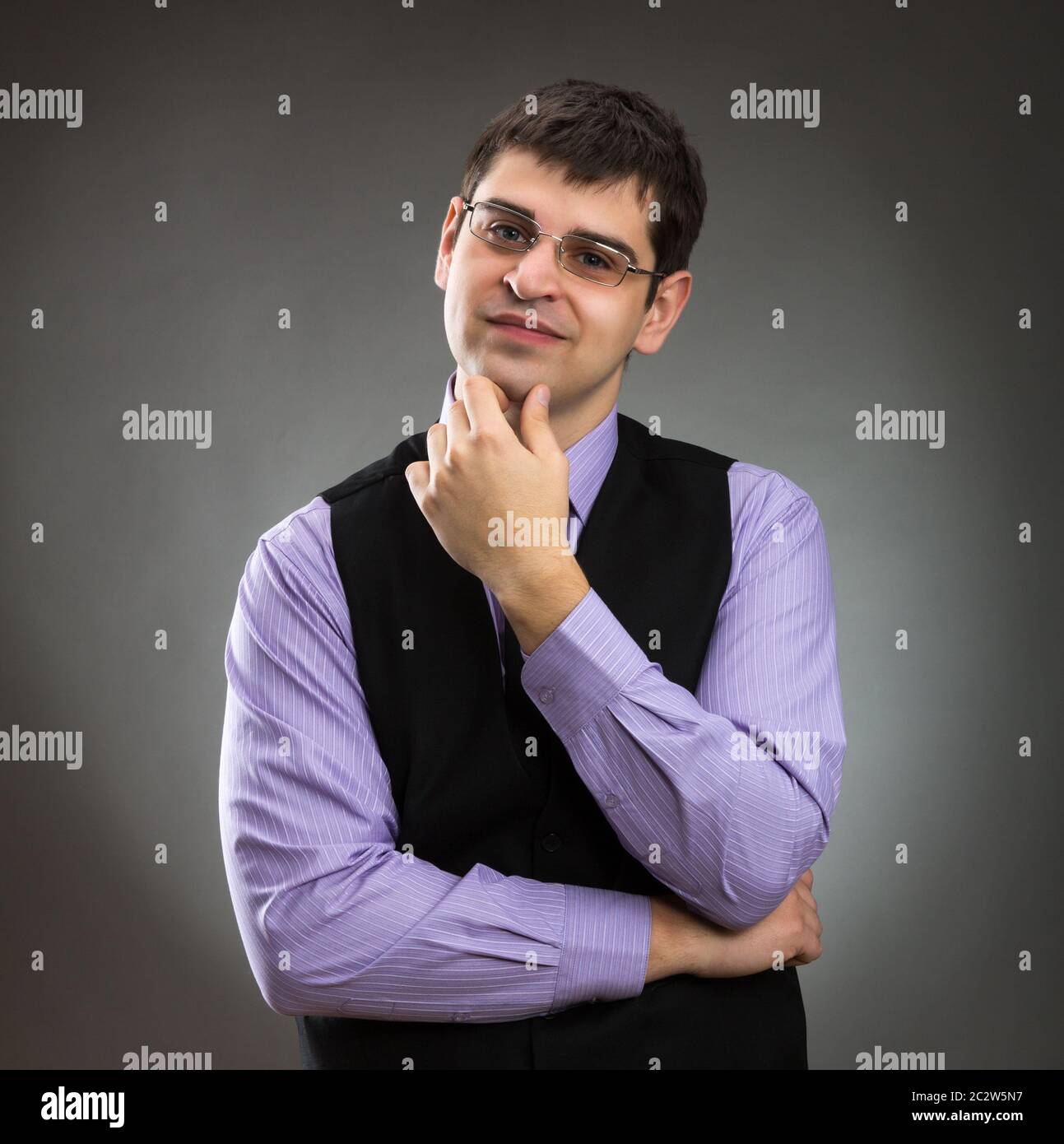 Calm businessman front view in studio Stock Photo - Alamy