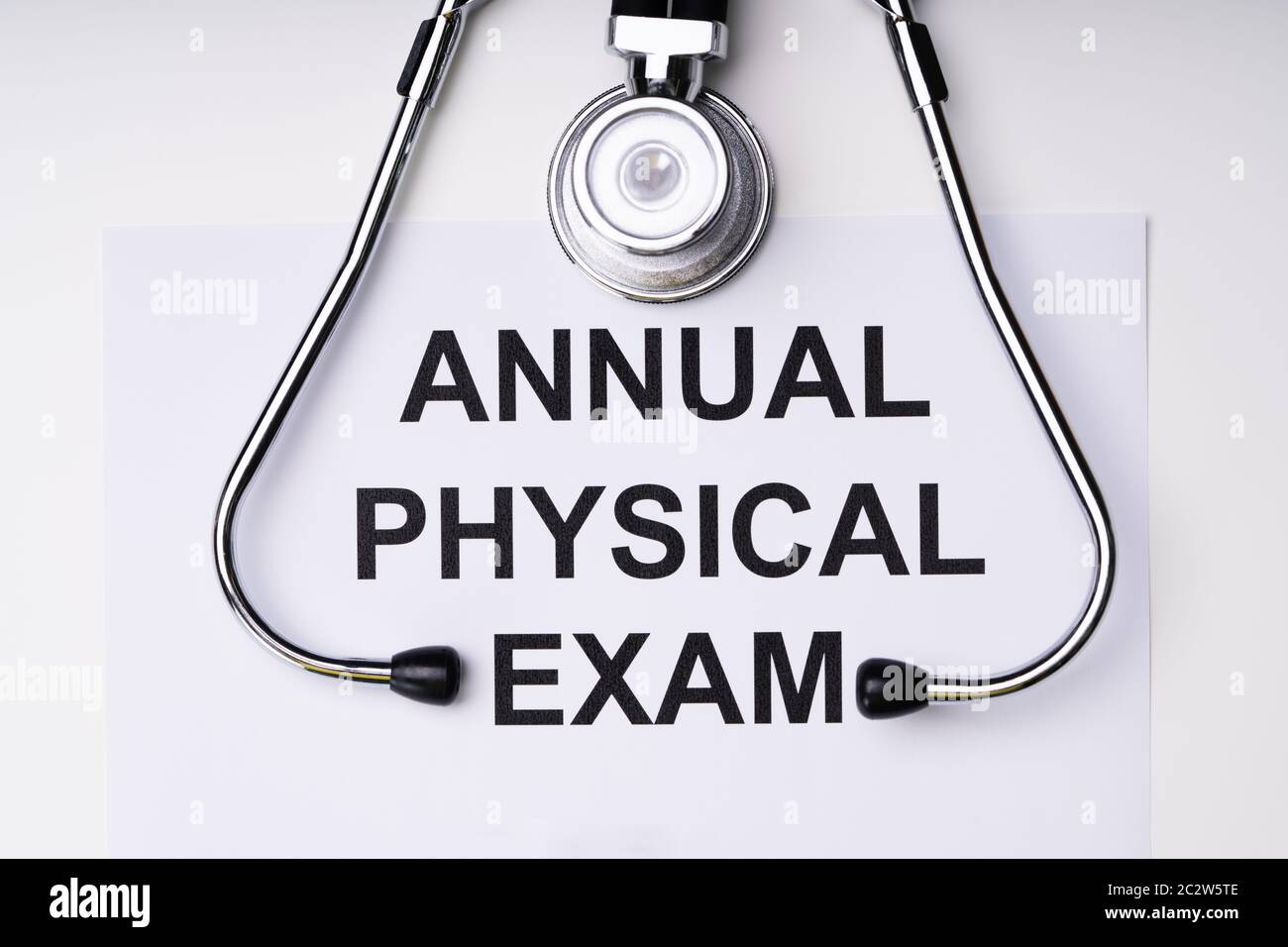High Angle View Of Annual Physical Exam Form With Stethoscope And ...