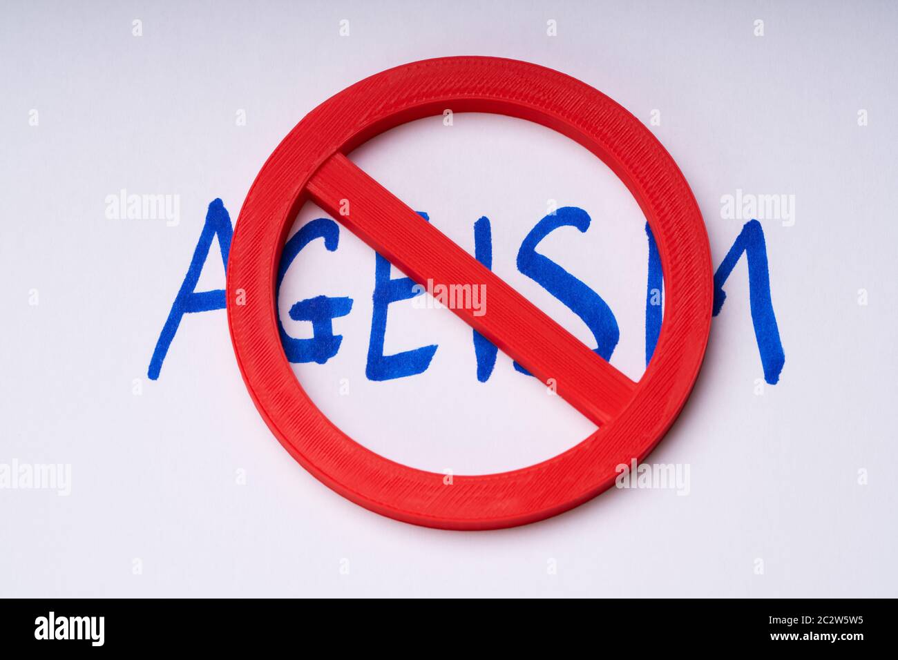 Red Stop Sign On Handwritten Ageism Text Over White Backdrop Stock ...