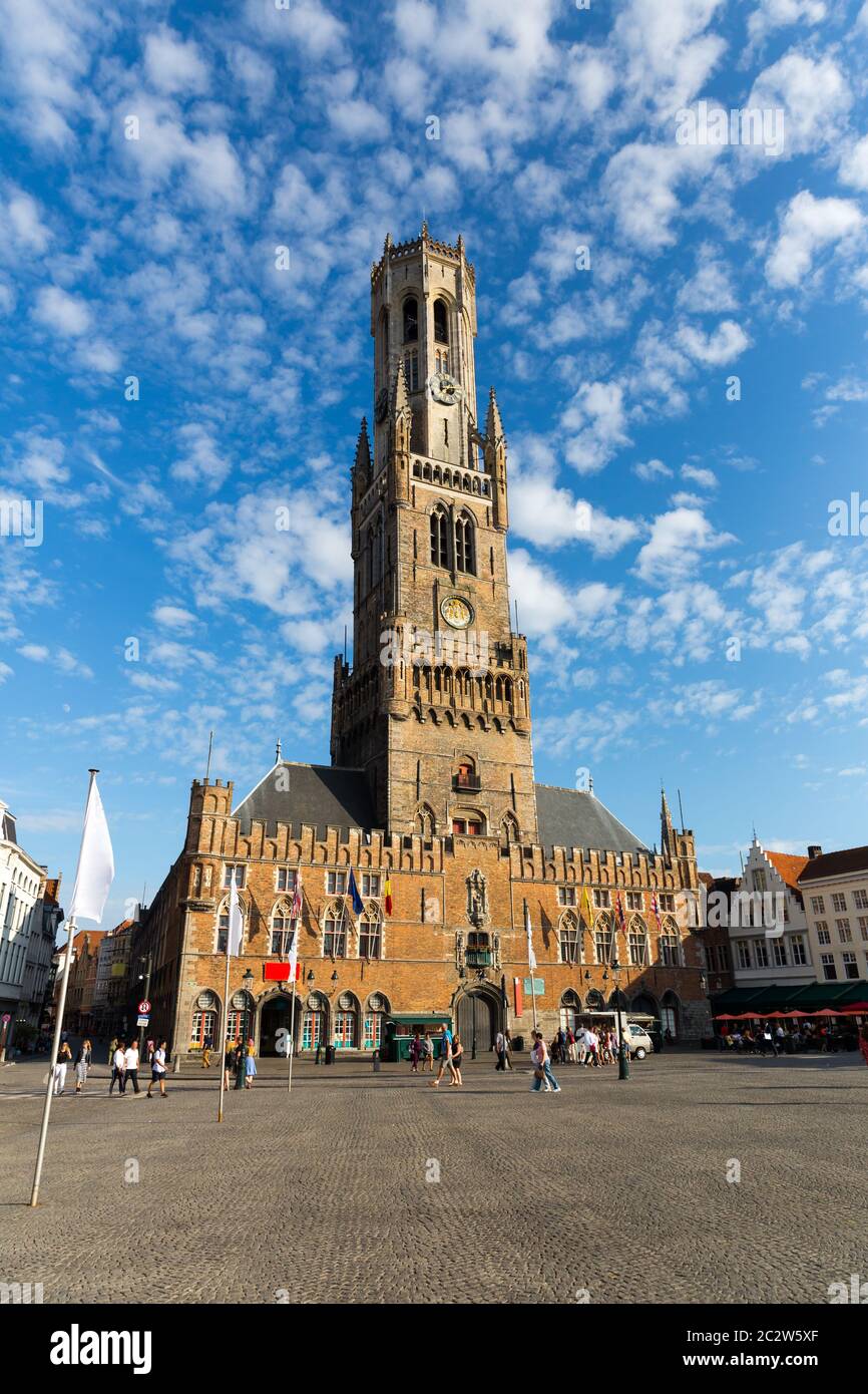 Ancient clock tower in provincial European town, bottom view. Summer ...