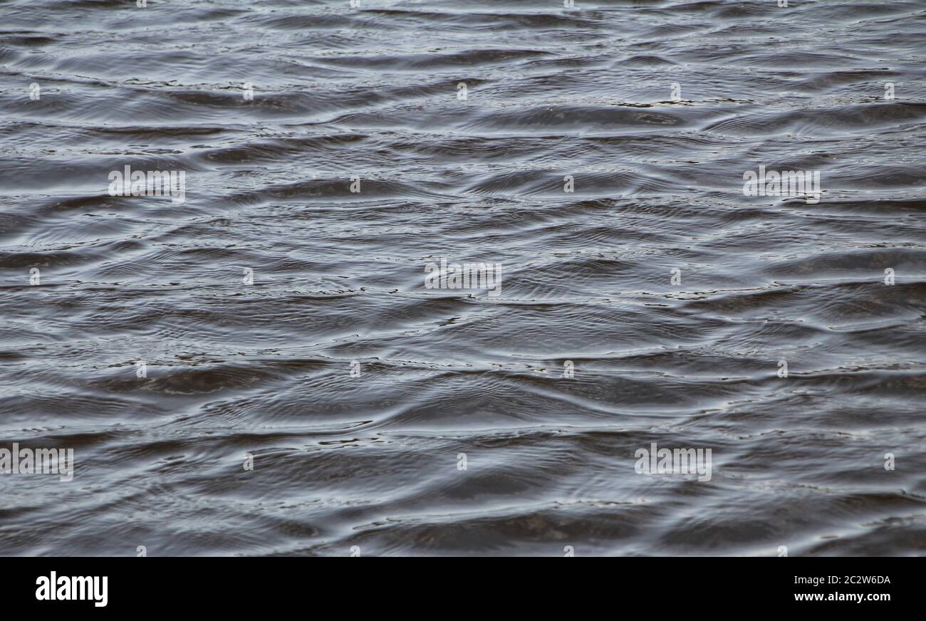 Texture of sea water during a light wave Stock Photo - Alamy