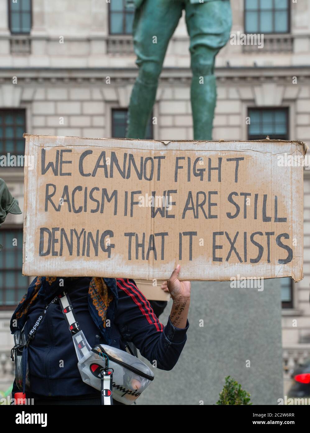 Anti-racism campaigner with sign, at the Black Lives Matter ...