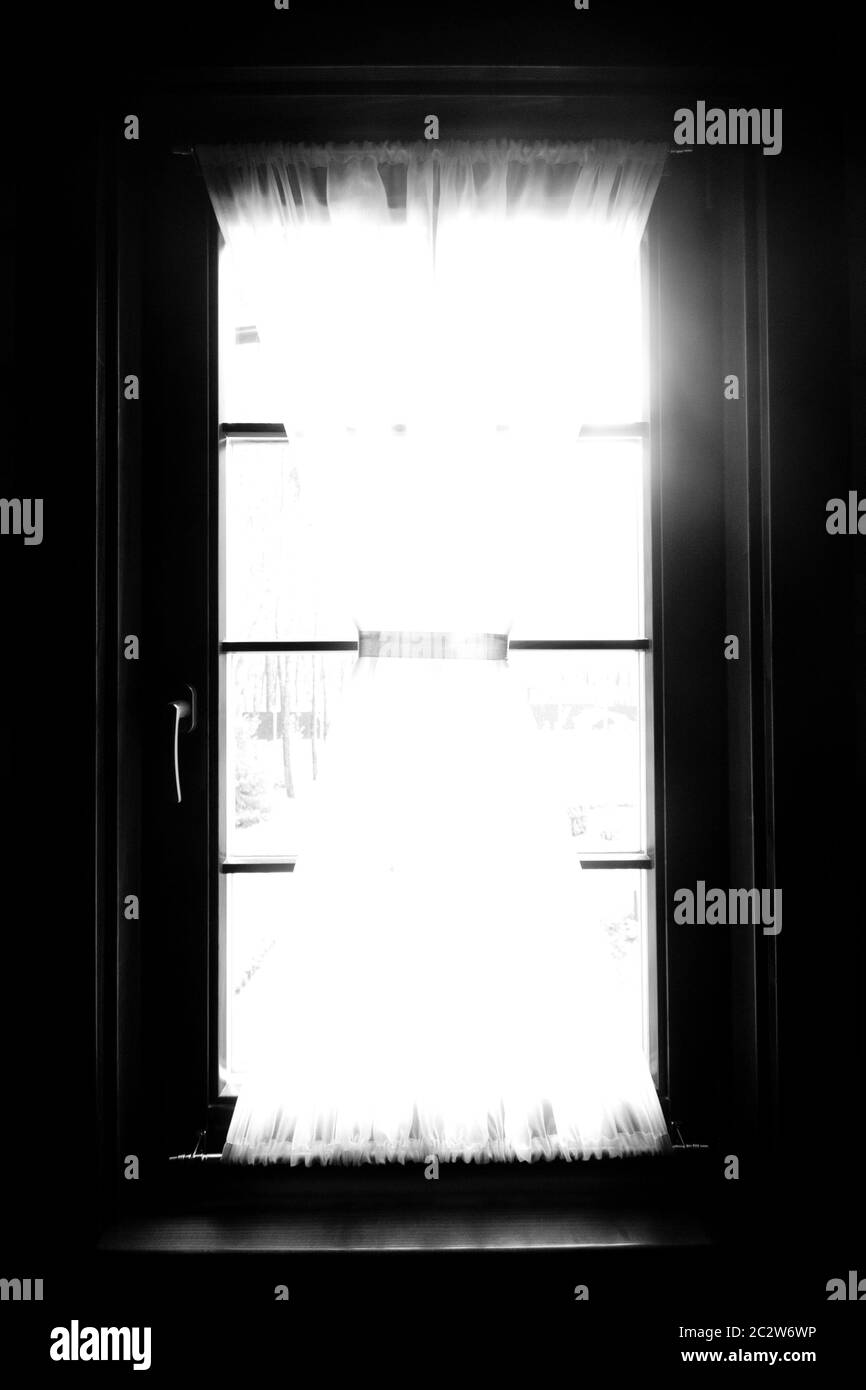 Sunlight window in dark room Stock Photo - Alamy
