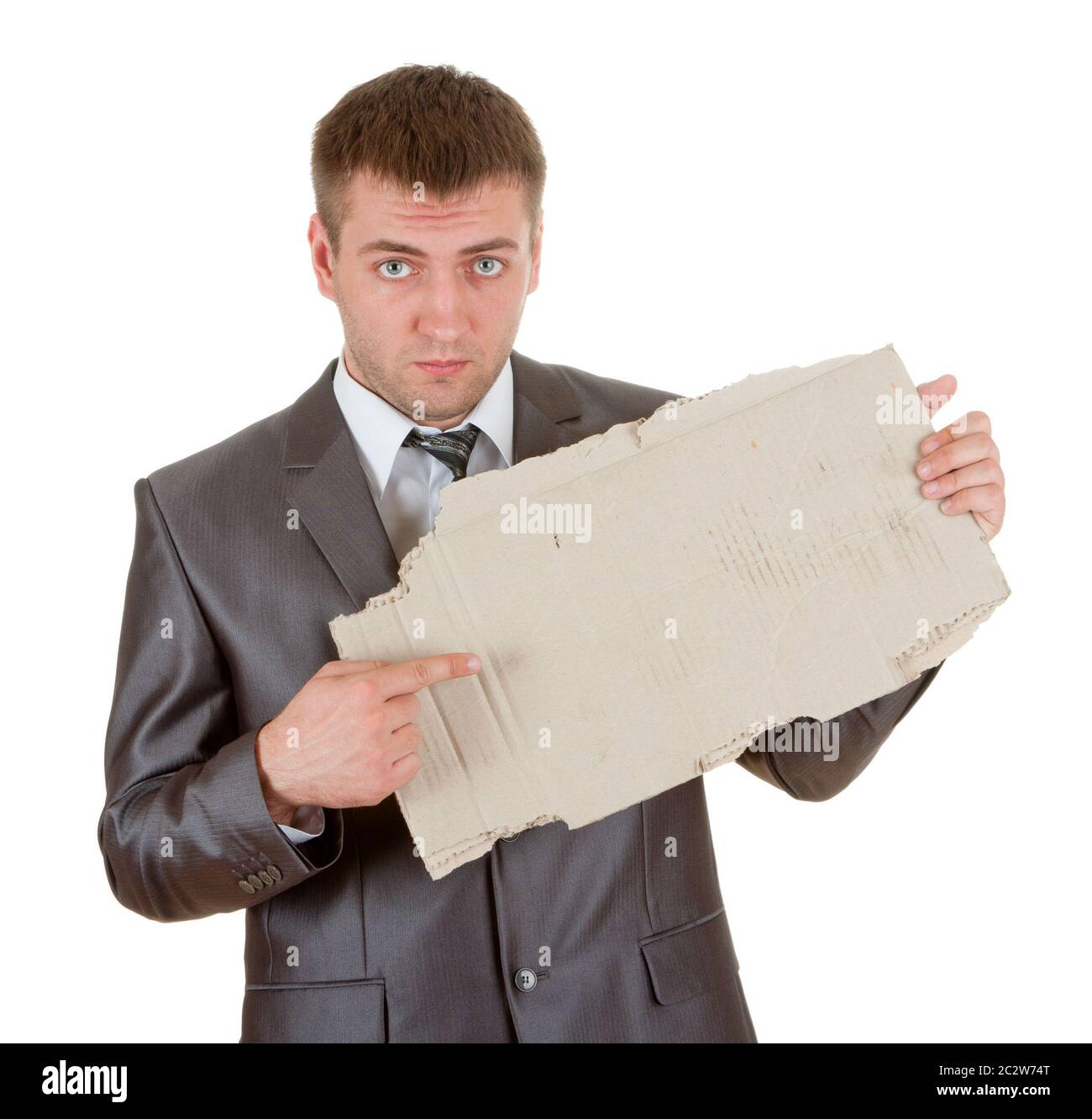 Sad businessman with messy cardboard frame. Isolated on white Stock ...
