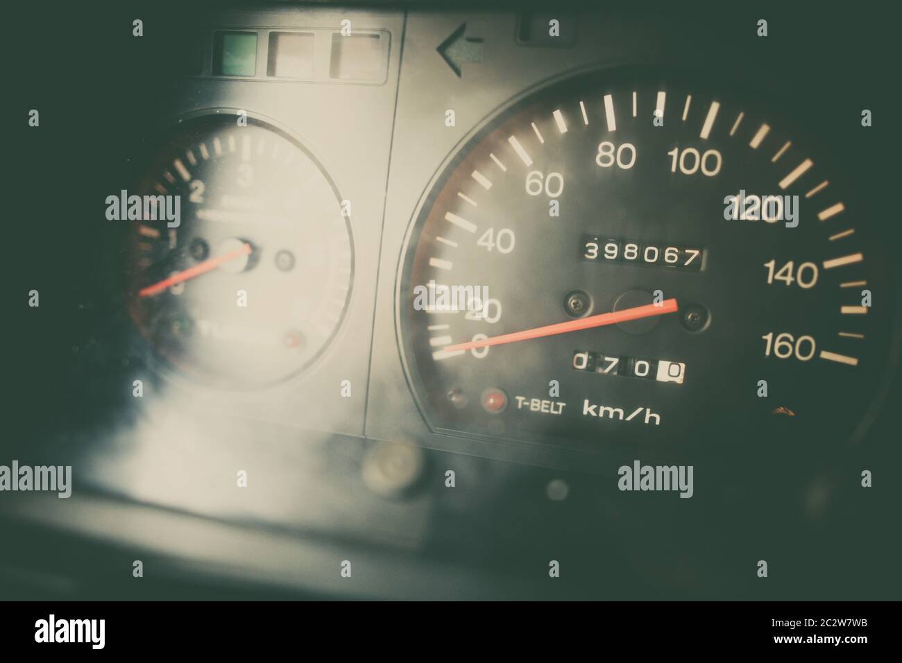 Color close up shot of a blue speedometer on a vintage car's dashboard ...