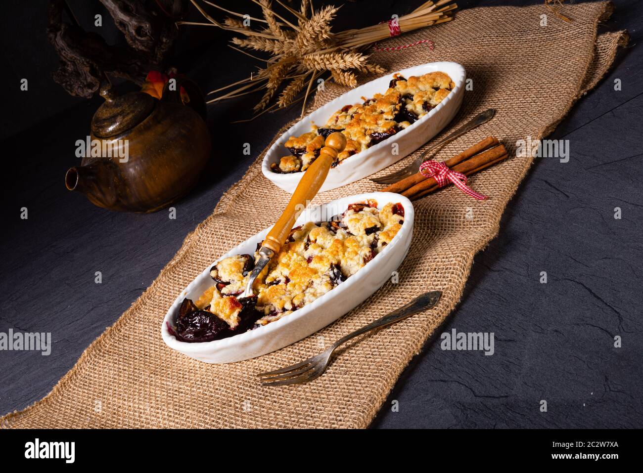 Cinnamon prunes with crumble Stock Photo - Alamy
