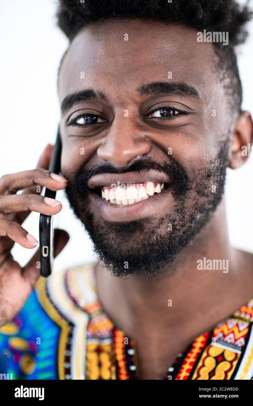 african man on phone Stock Photo - Alamy