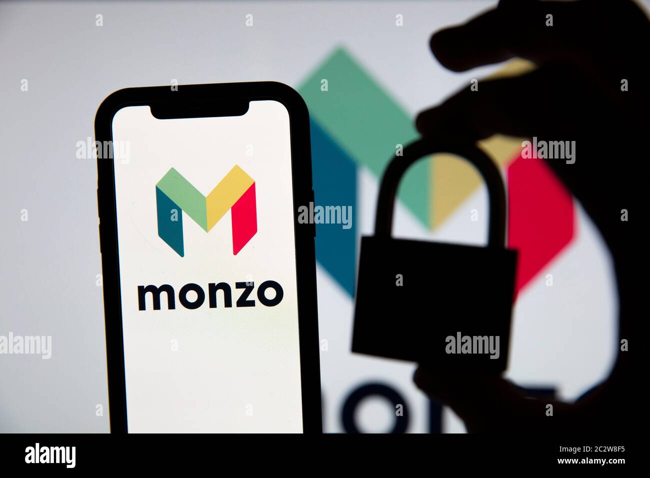 LONDON, UK - June 2020: Monzo online bank logo with security padlock ...