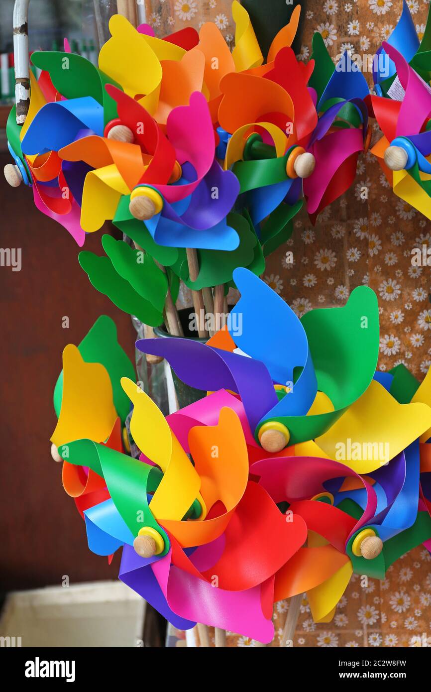 Plastic Rainbow Windmill Spinners Decor Stock Photo - Alamy