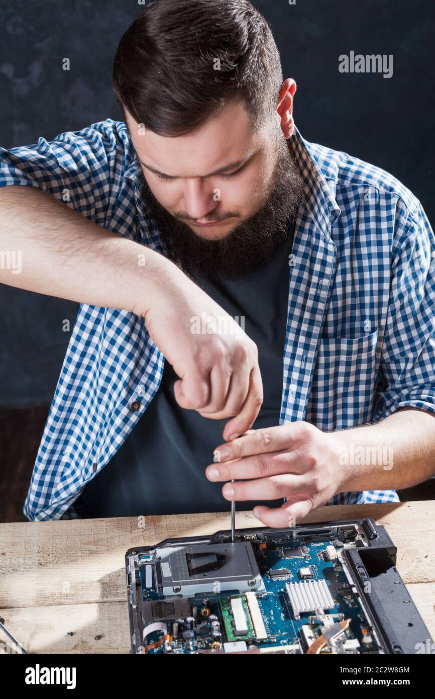 Disassembling laptop hi-res stock photography and images - Alamy