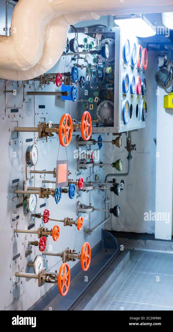 Engineering interior of aircraft carrier including pipes, cables, pumps ...