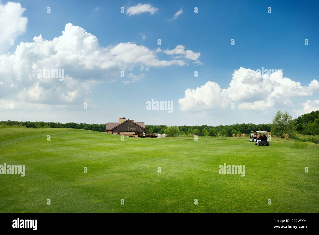 Trimmed field and sand bunkers for game on golf course, nobody. Green ...