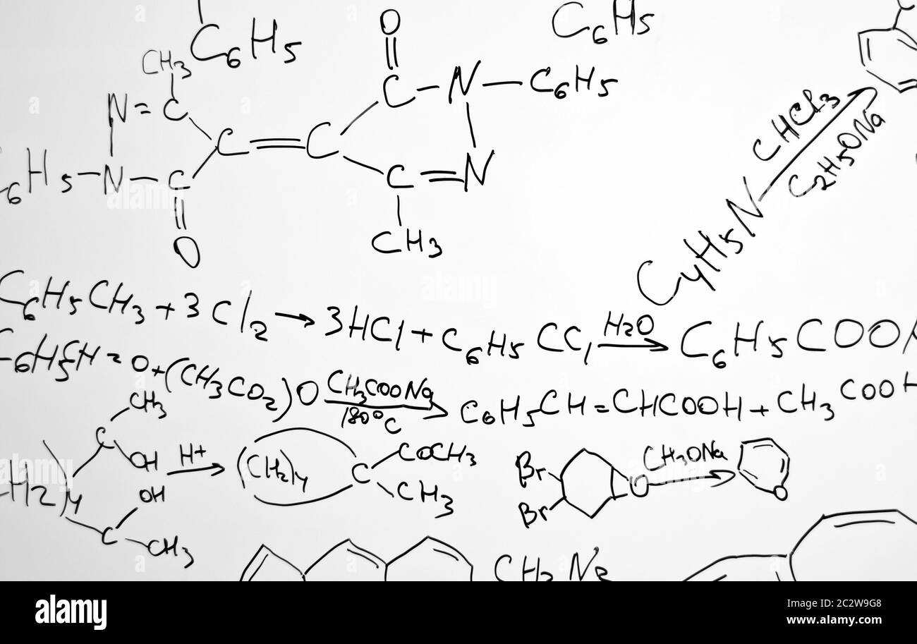 Chemistry science formulas on white board Stock Photo - Alamy