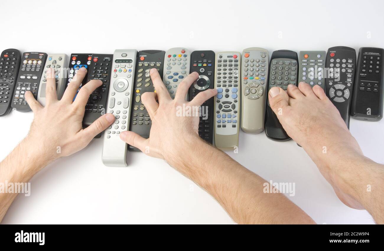 Two hands and led pushing buttons on romote controlers Stock Photo - Alamy