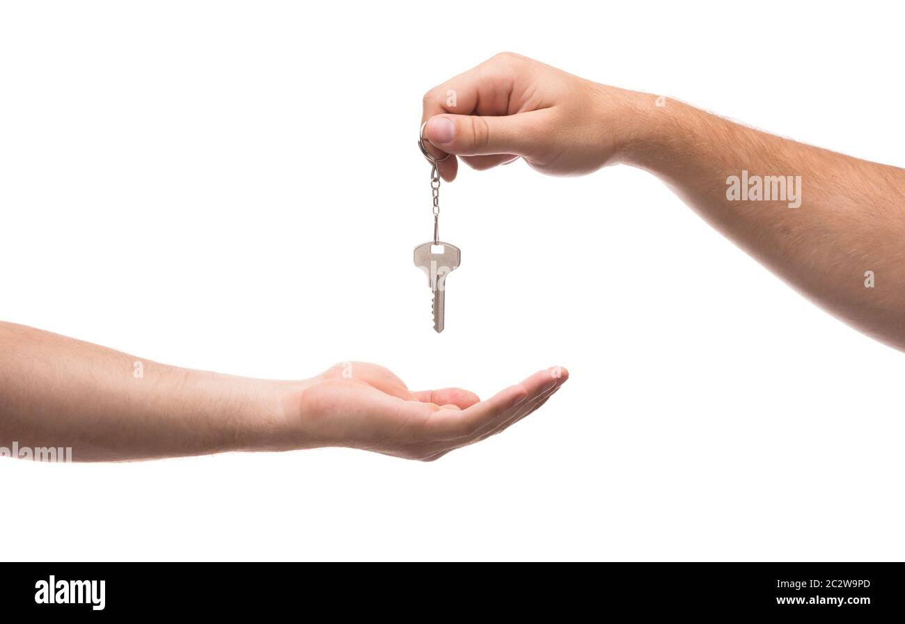 Hand giving key another hand hi-res stock photography and images - Alamy