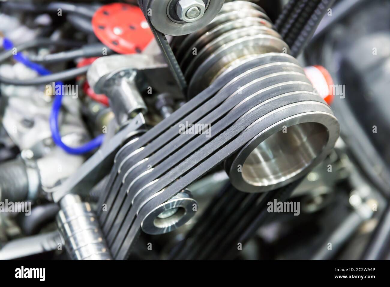 Macro of a powerful car engine parts Stock Photo - Alamy