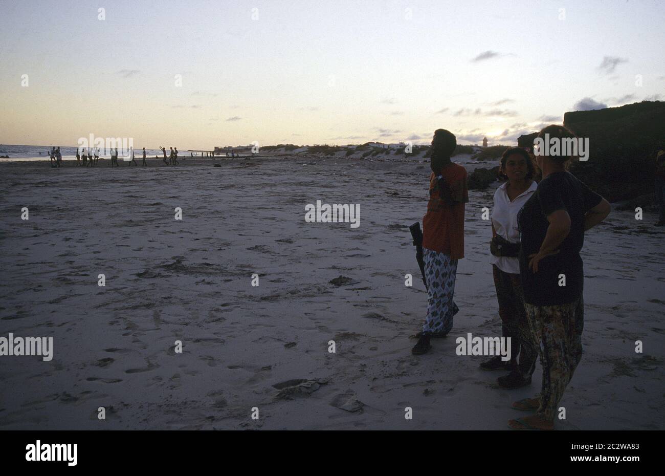 MSF staff enjoy sunset on beach in Mogadishu Somalia 1994 Stock Photo ...