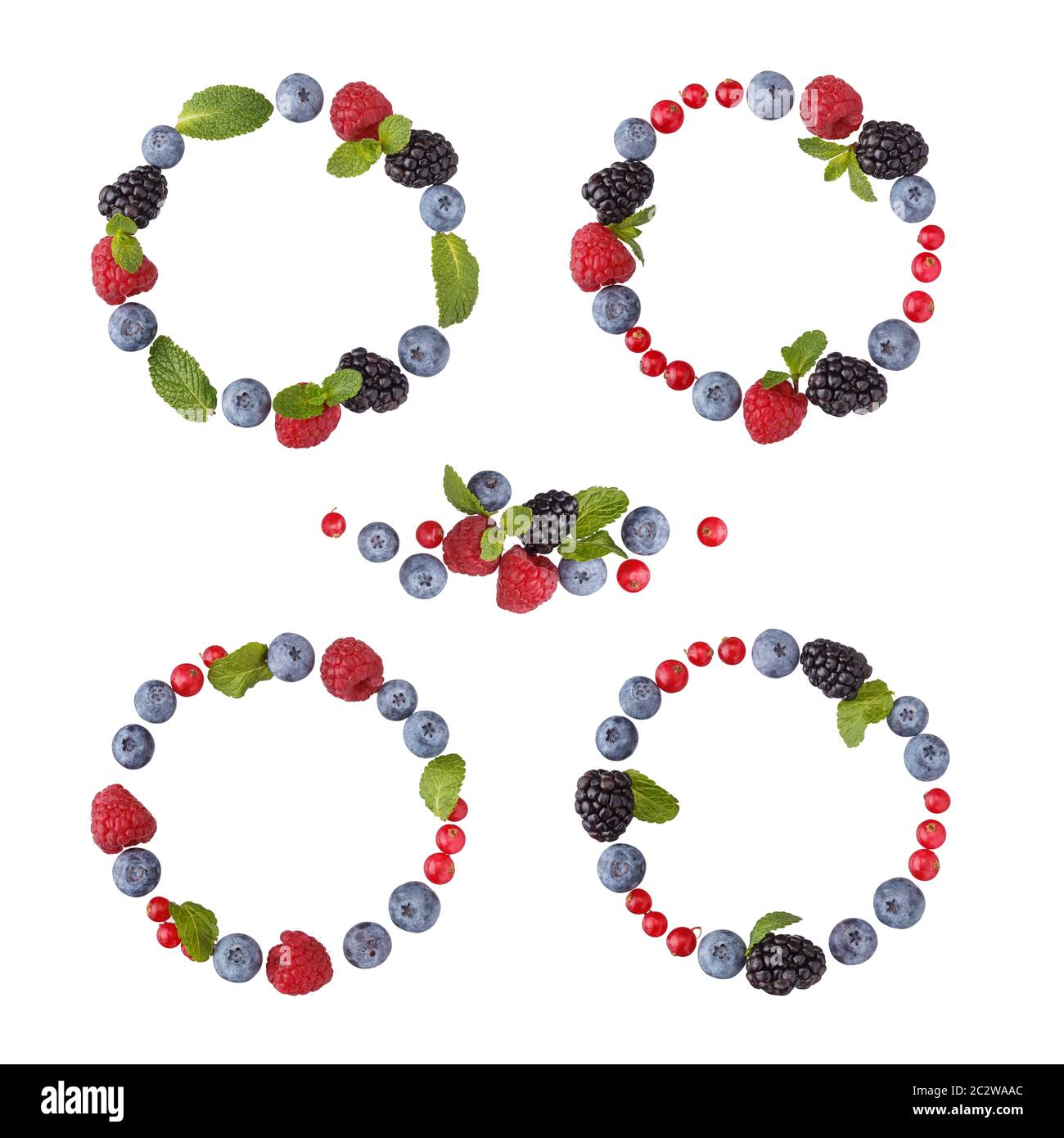 Mix of different berries isolated on white background Stock Photo - Alamy