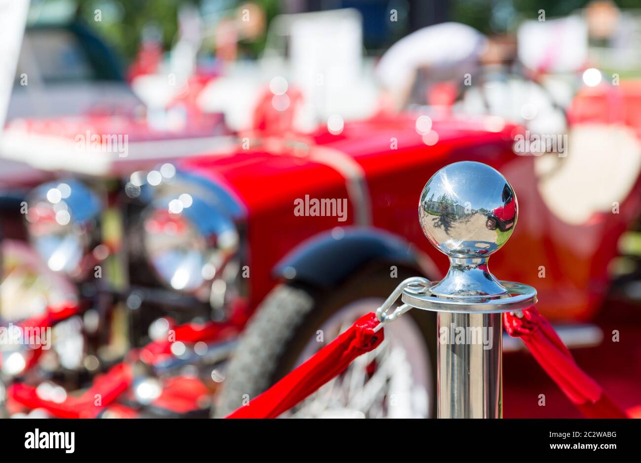 Metal column of enclosure on car exhibition Stock Photo - Alamy