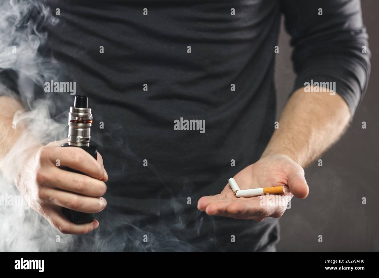 Vaping flavored e-liquid from an electronic cigarette Stock Photo - Alamy