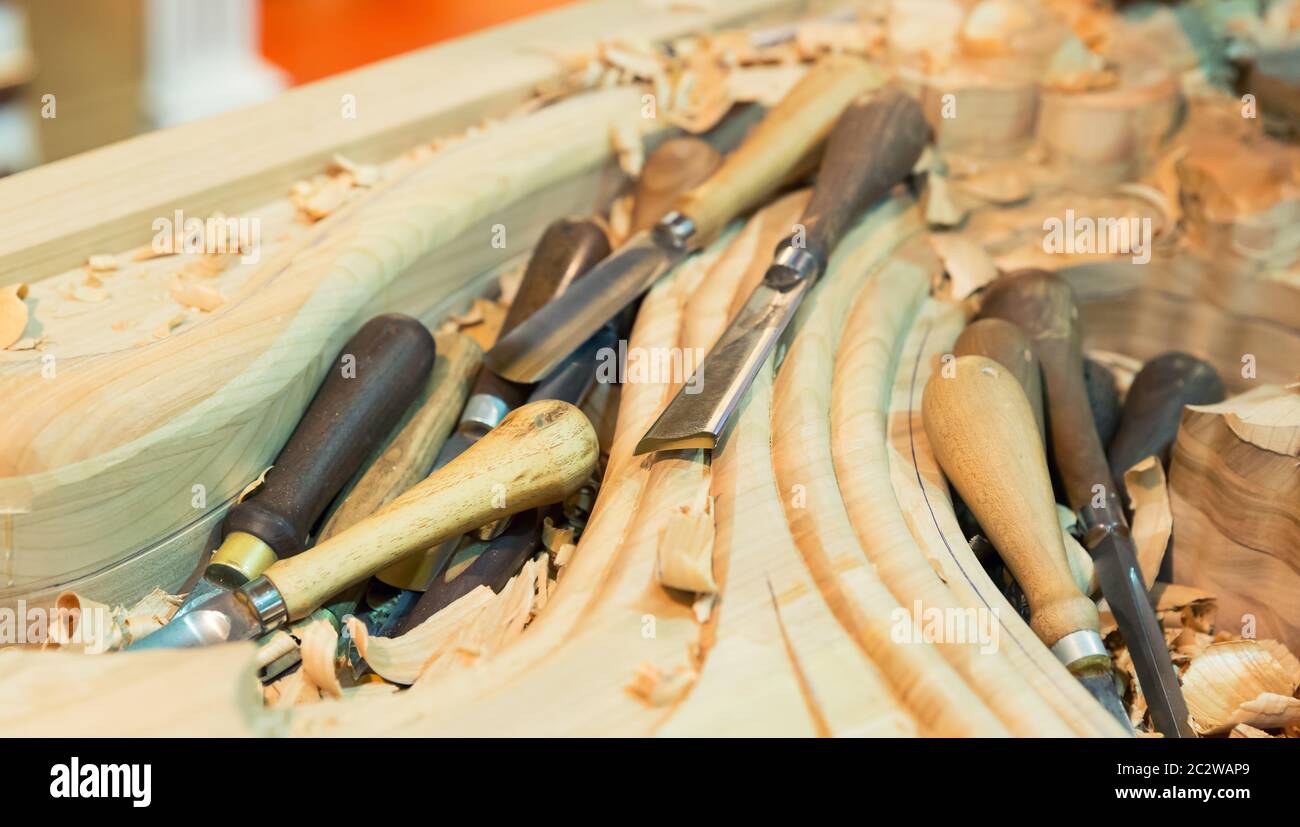 The wood carving tools with billets, close up Stock Photo - Alamy