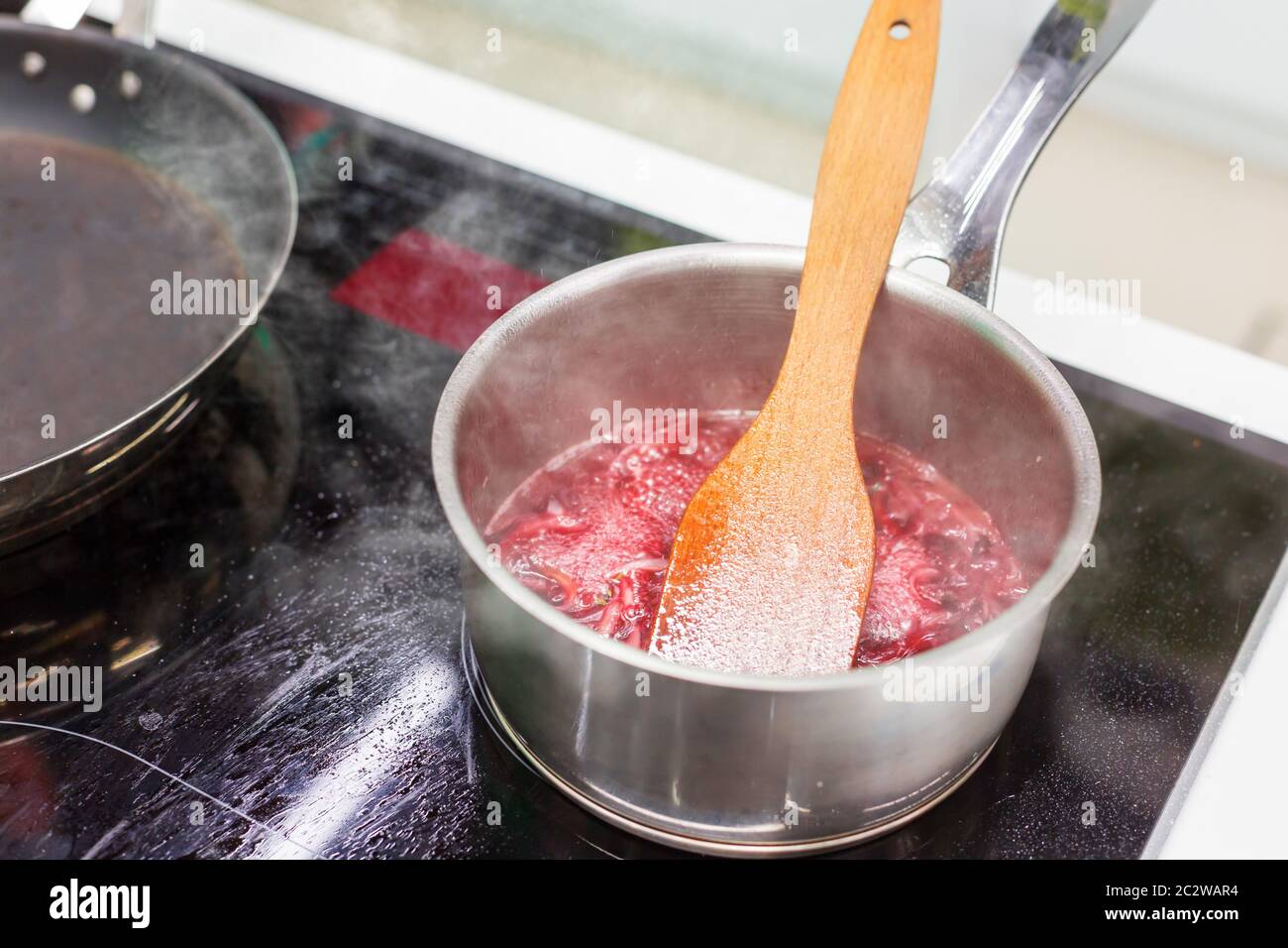Sauce boiling in pot hi-res stock photography and images - Alamy