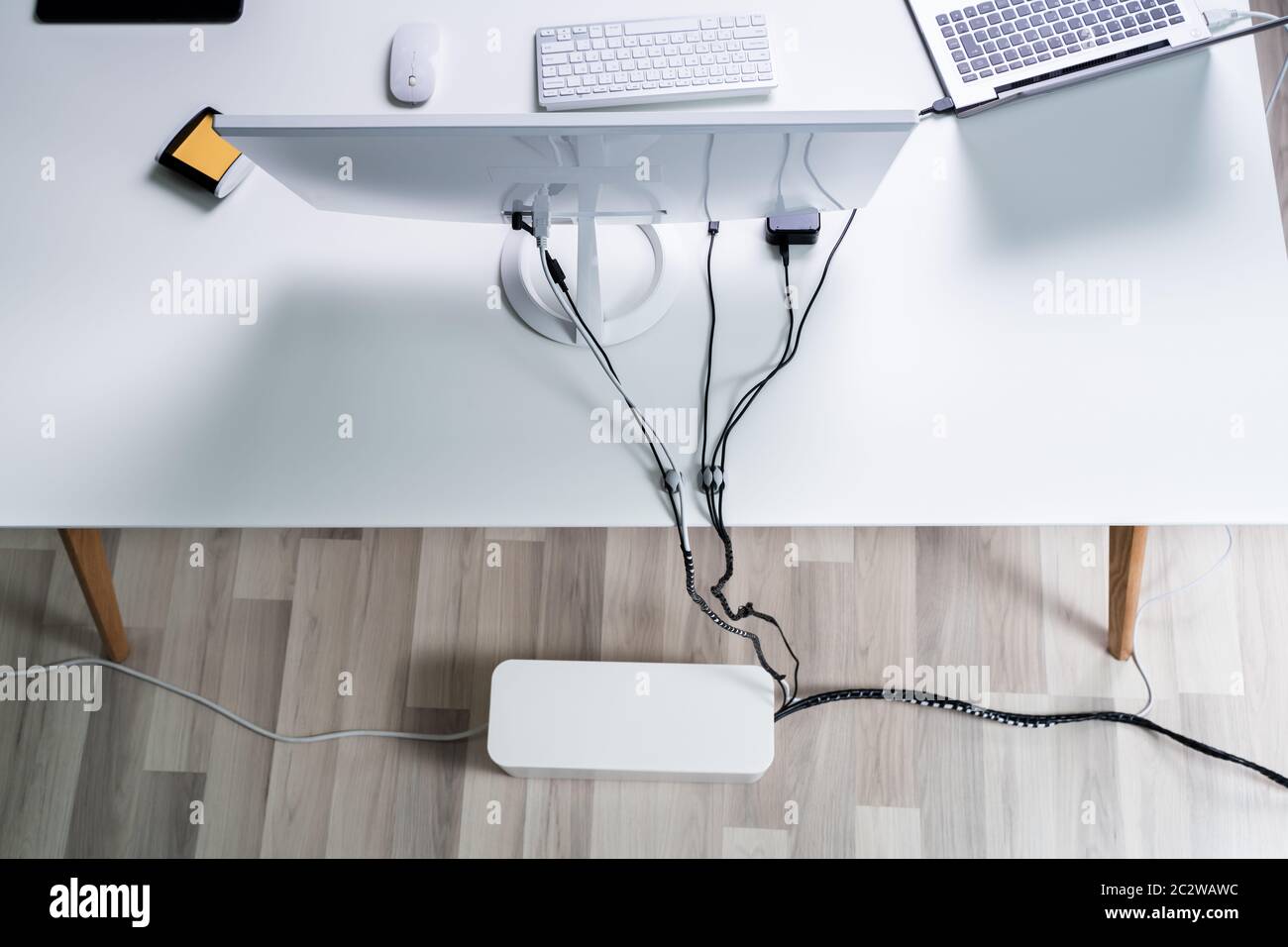 Elevated View Of Compute And Laptop On Desk With Cable Organizer Box ...