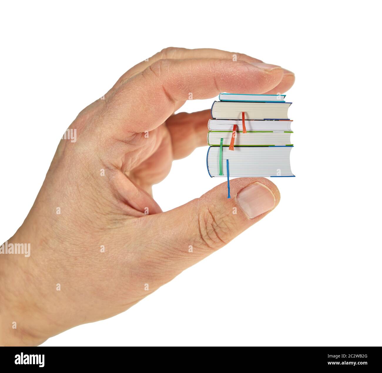 Hand with books Stock Photo - Alamy