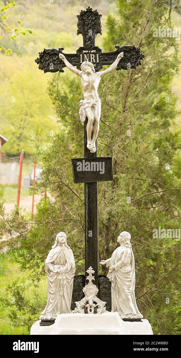Religious cross memorial with crucified Jesus Stock Photo - Alamy