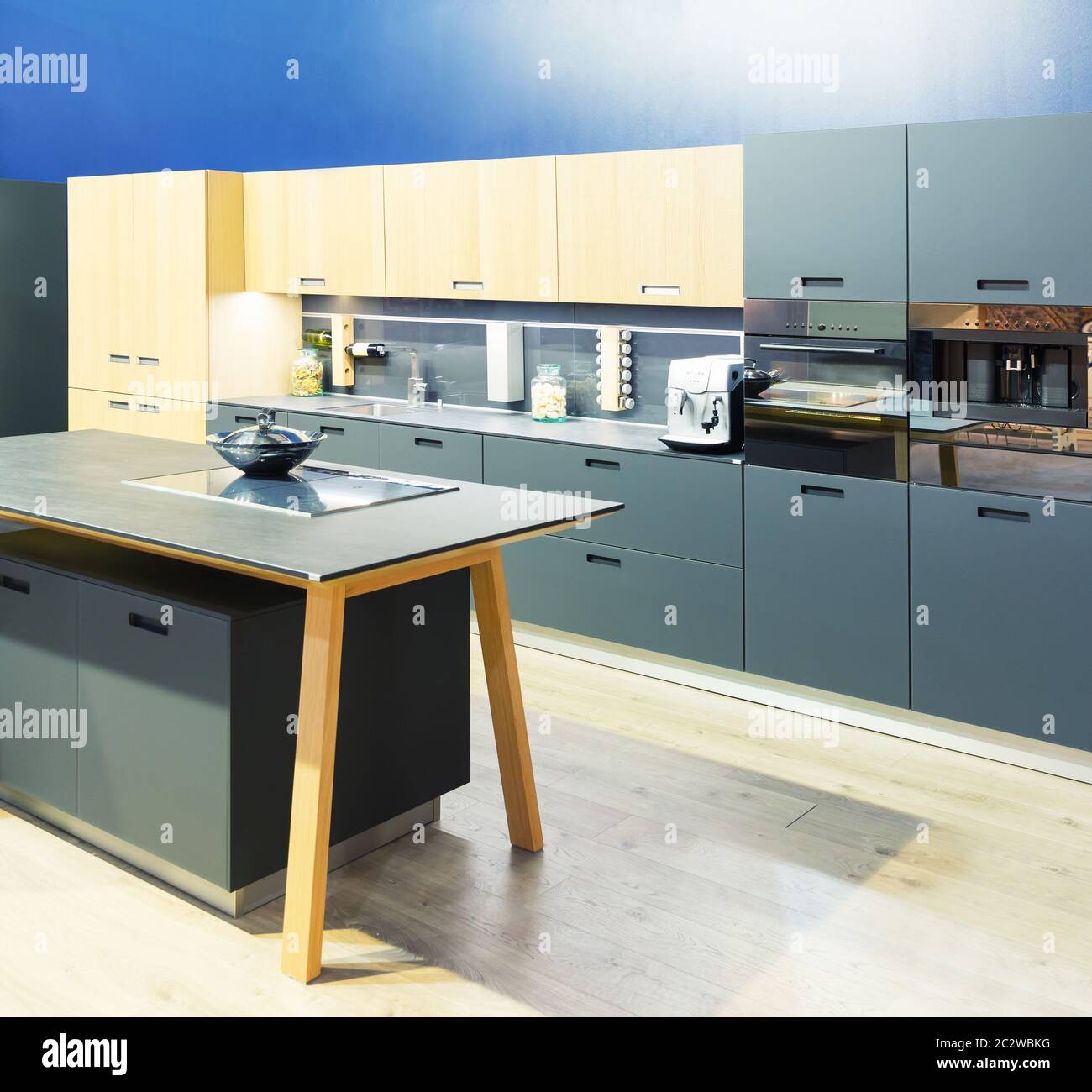 Modern light white and silver kitchen interior design Stock Photo - Alamy