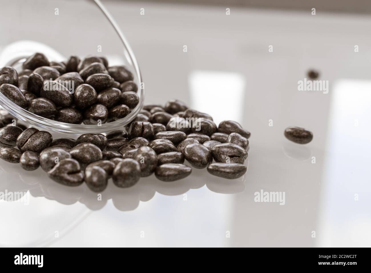 a bowl filled with bridge mix chocolate candy Stock Photo - Alamy