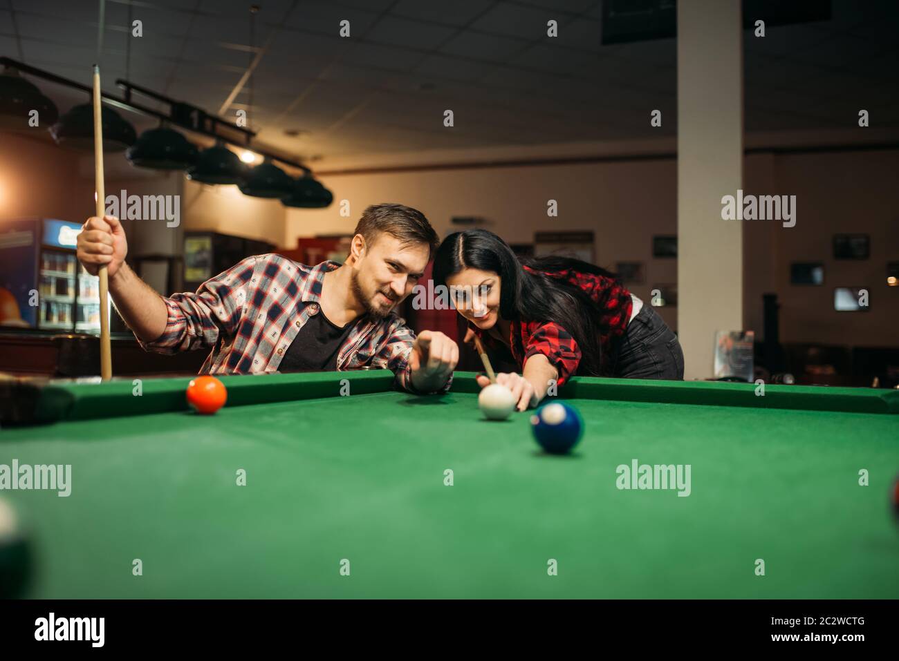 Woman in billiard hall hi-res stock photography and images - Alamy