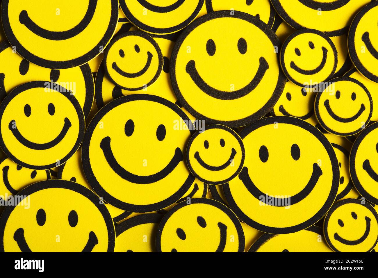 Background of many yellow smileys Stock Photo - Alamy