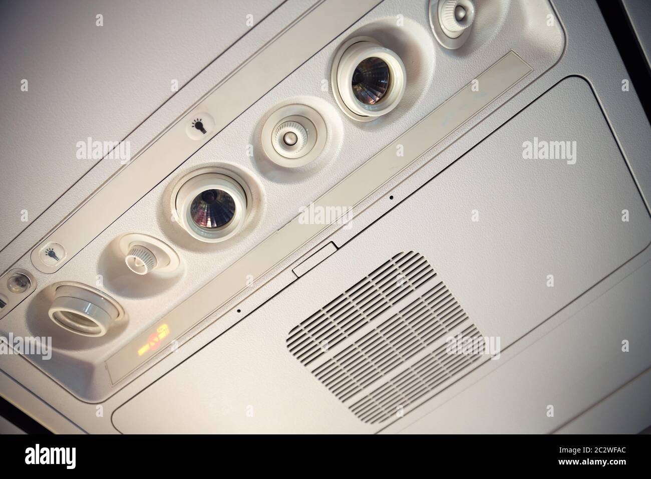 Aeroplane overhead console with air conditioning and lighting Stock ...