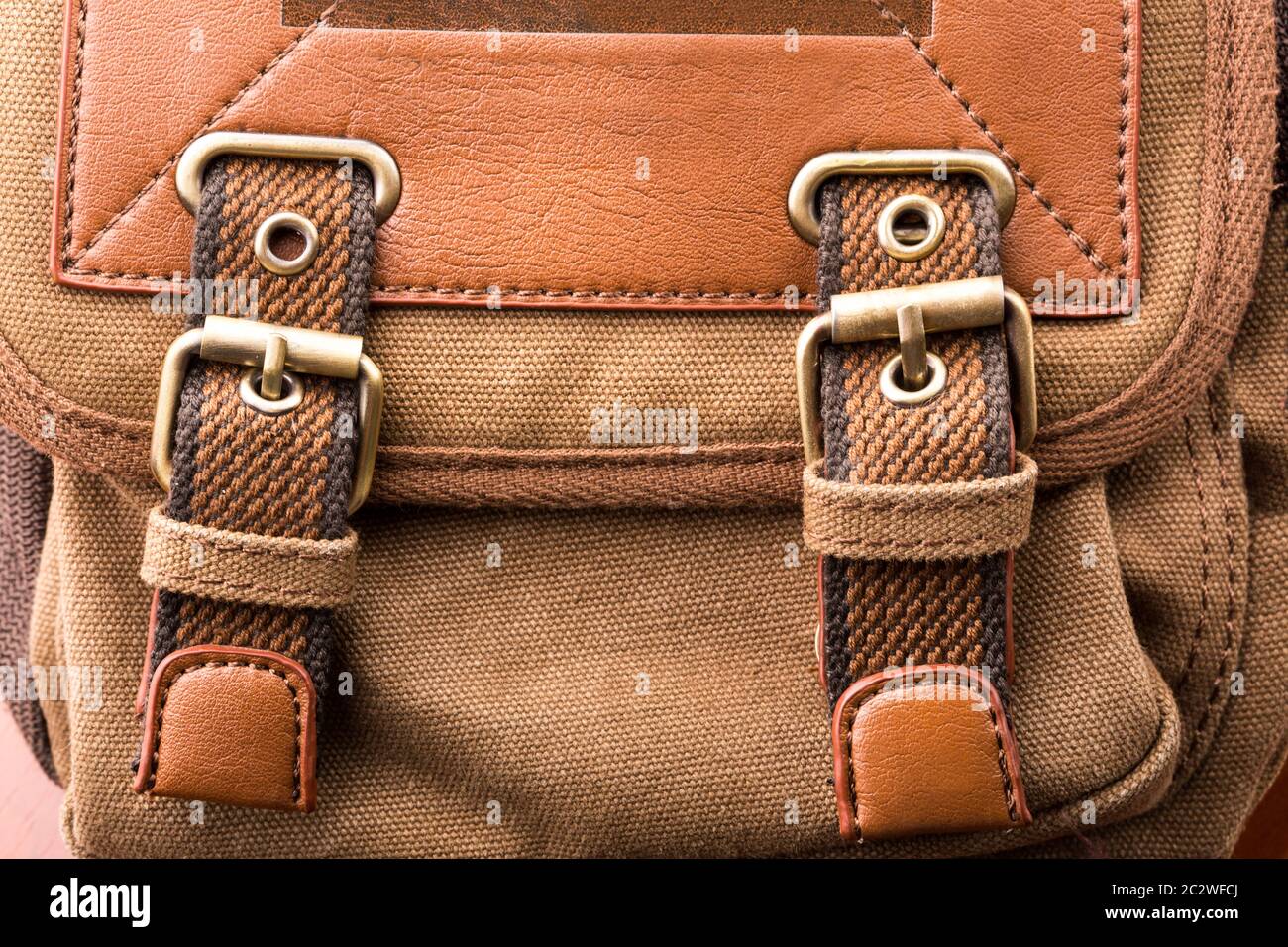 A close up of brown backpack buckle Stock Photo - Alamy
