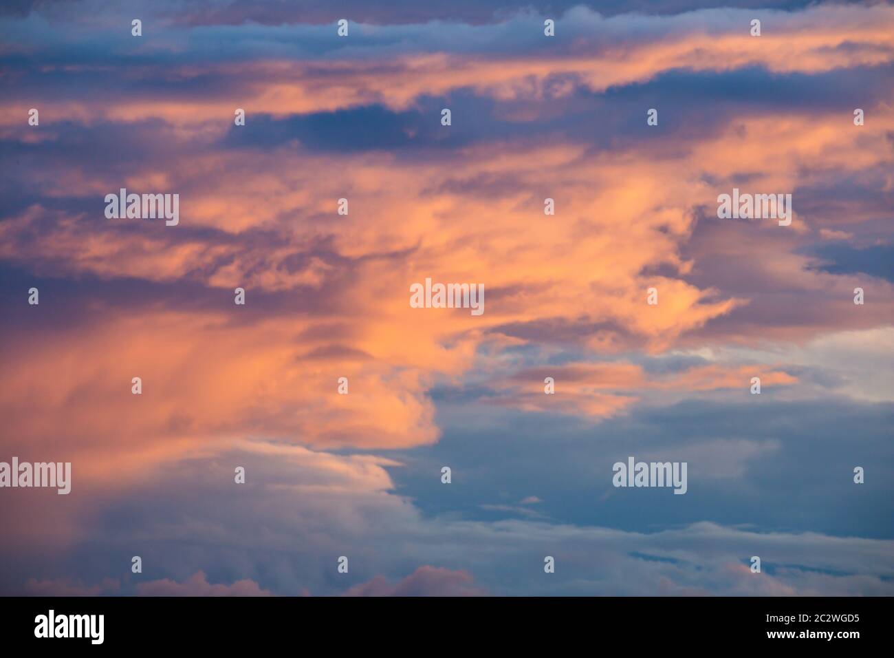 Autumn sky before dawn, the first rays of sunlight color the sky with ...
