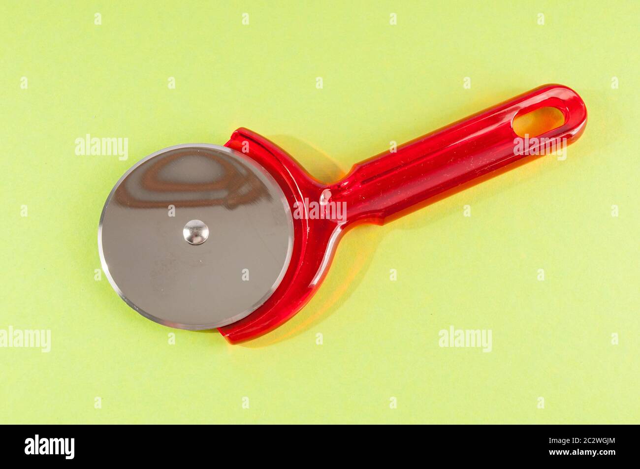 Picture of Plastic Red Pizza Cutter Slicer Knife Stock Photo - Alamy