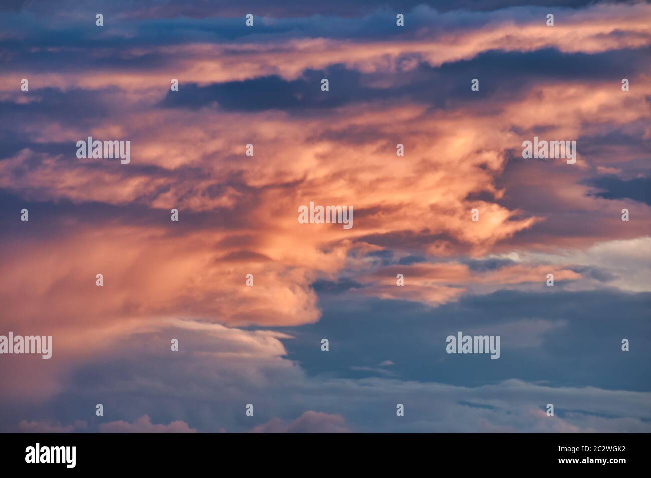 Autumn sky before dawn, the first rays of sunlight color the sky with ...