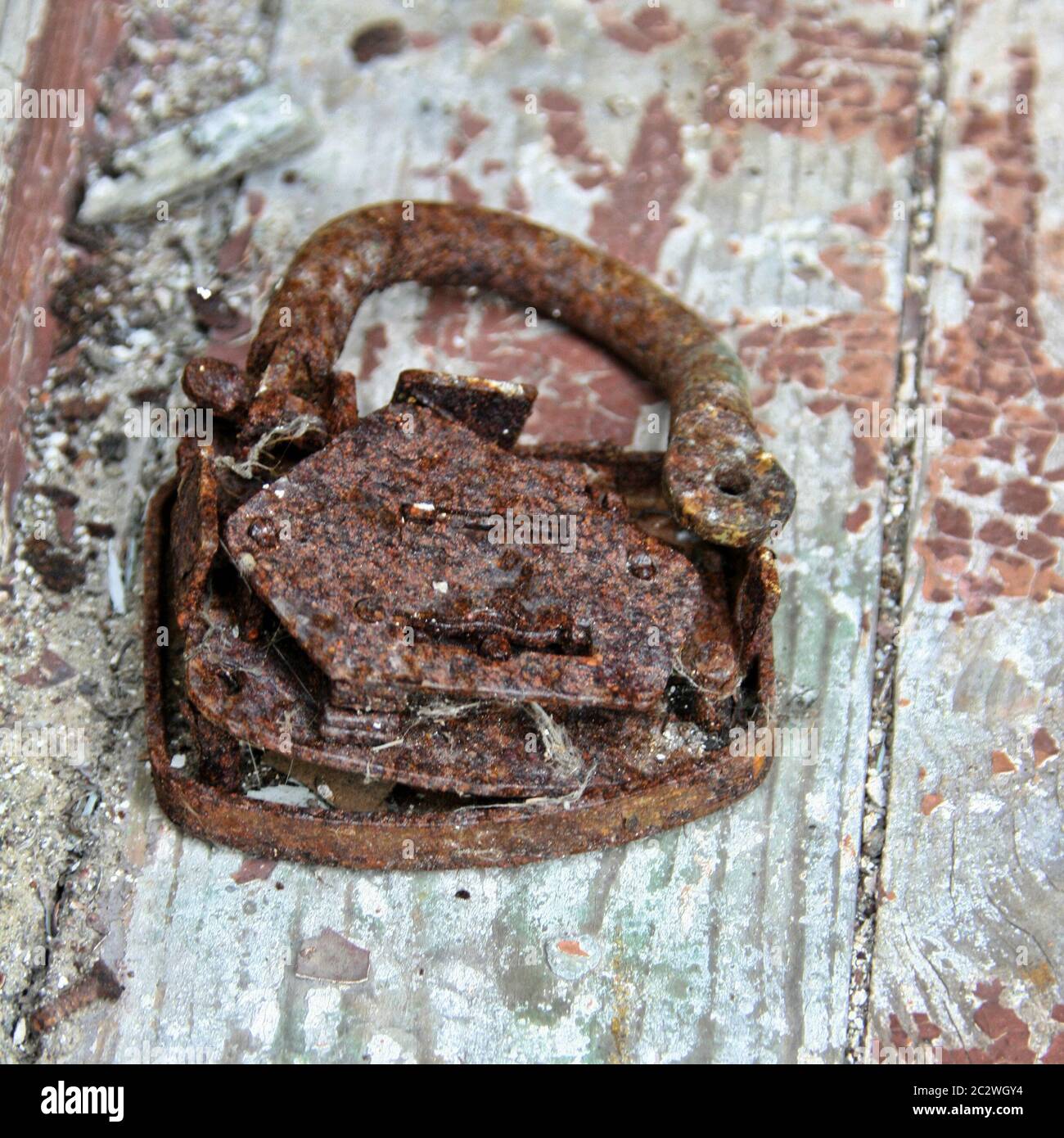 Old broken rusty lock on wood Stock Photo - Alamy