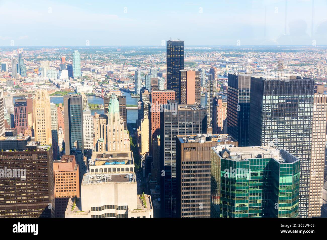 New York City Manhattan midtown aerial view with skyscrapers and blue ...