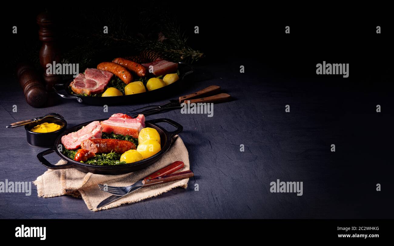 rustic kale with pinkel sausage and kassler Stock Photo - Alamy
